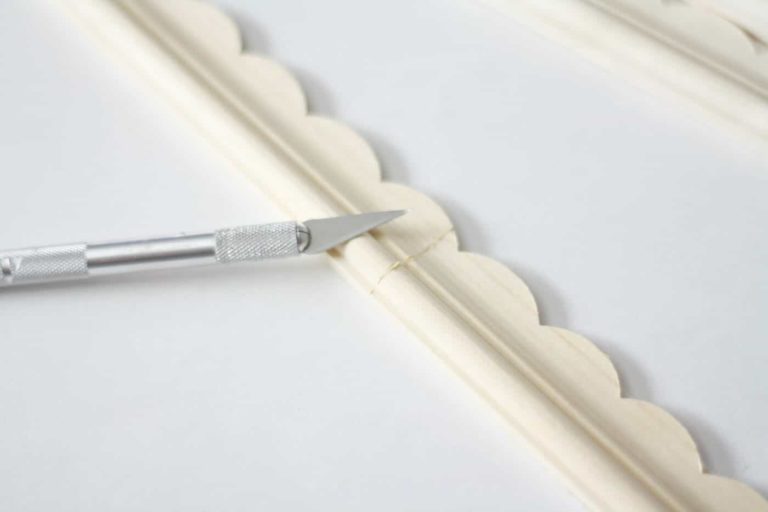 This DIY Poster Hanger is EASY & Budget Friendly - DIY Candy