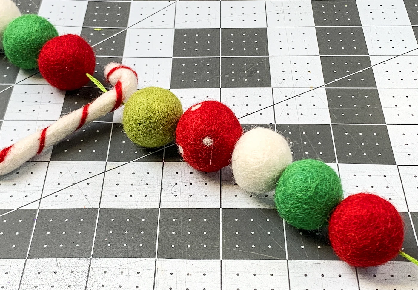 Make a Christmas Felt Ball Garland in Minutes - DIY Candy