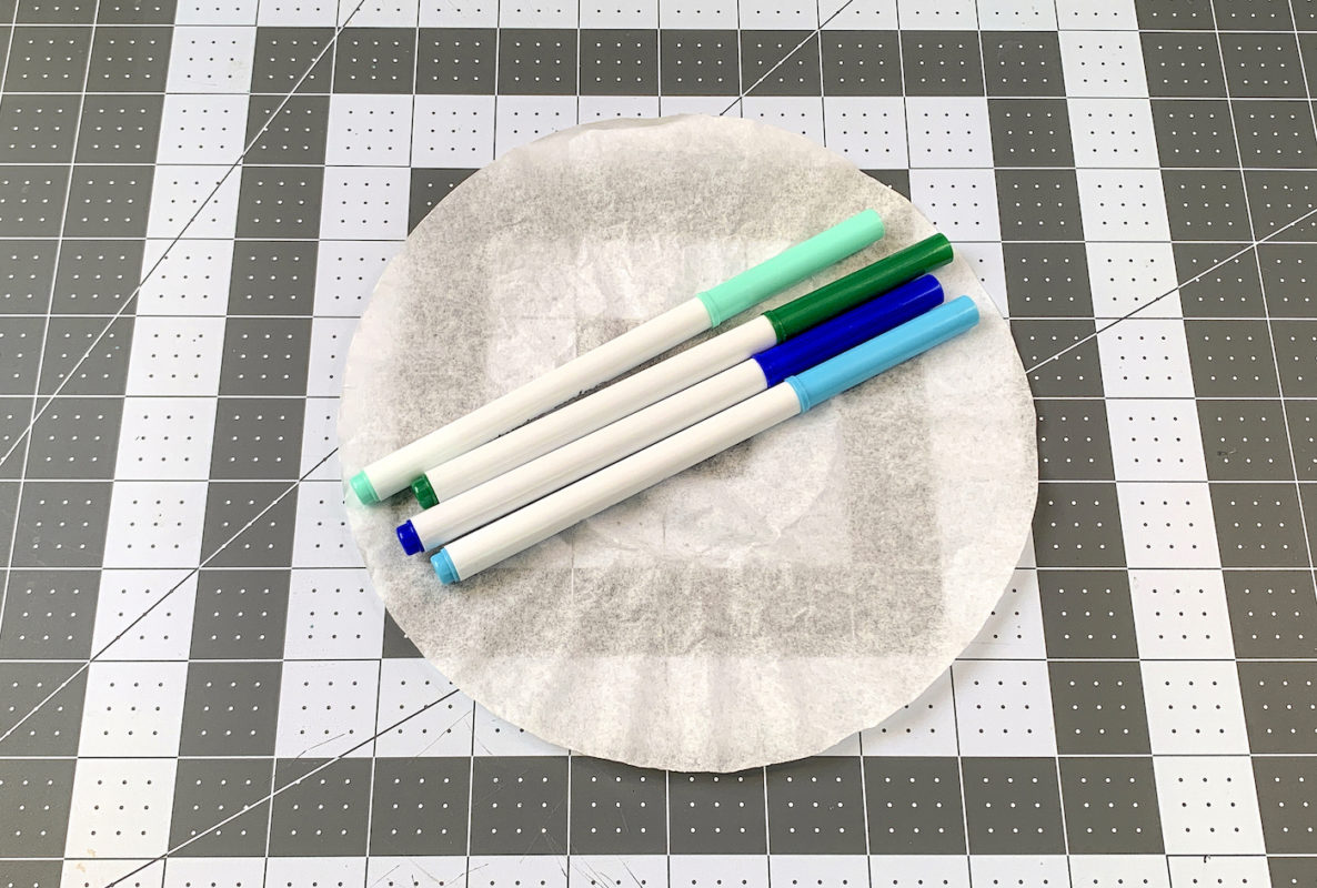 Coffee Filter Snowflakes for Winter Fun - DIY Candy